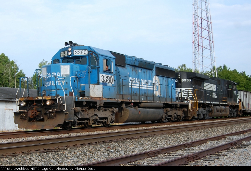 NS SD-40-2 # 3380 (still in CR Quality Colors) leads an eastbound coal train across Main St.